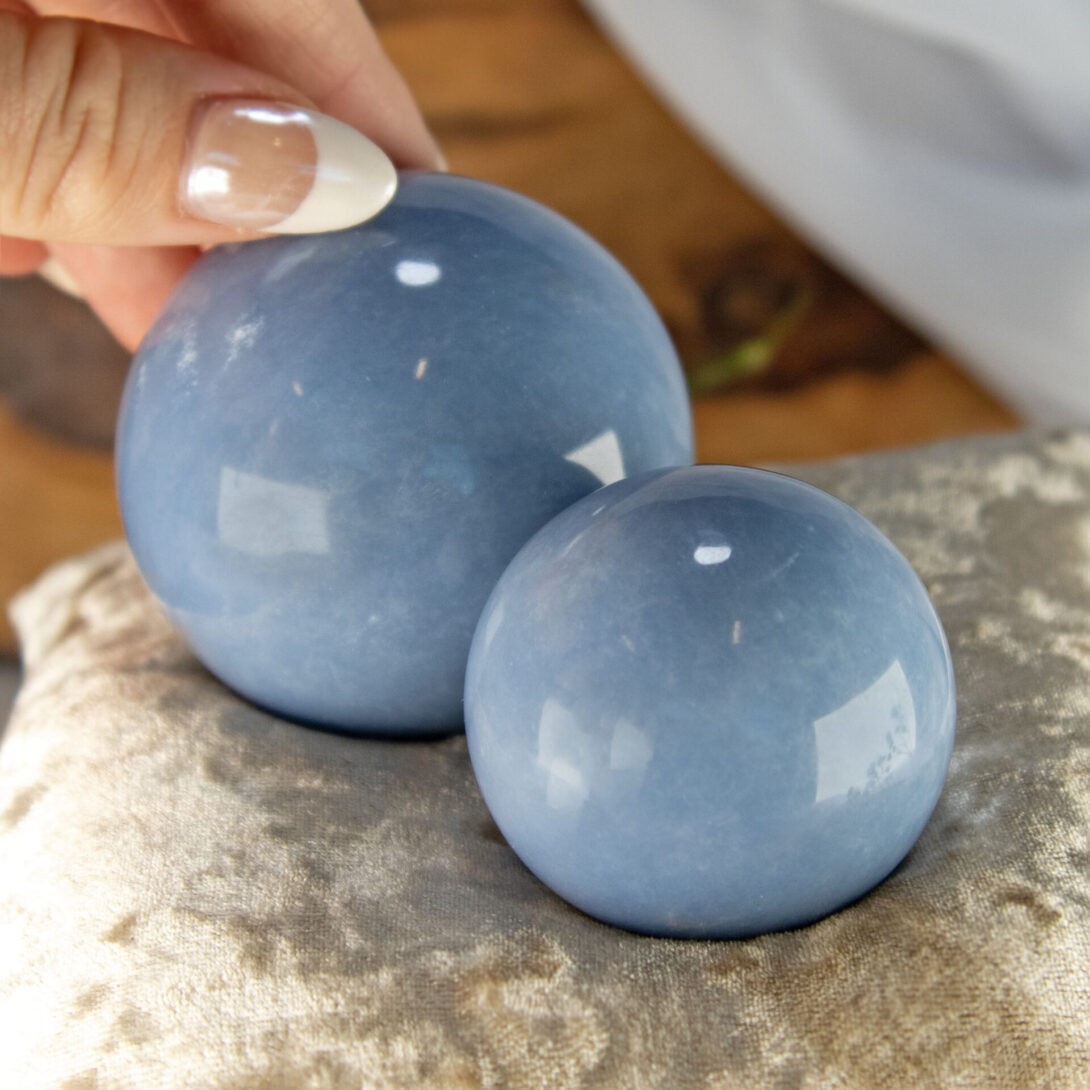 Home Shop Gems & Minerals Celestial Peace Angelite Sphere
