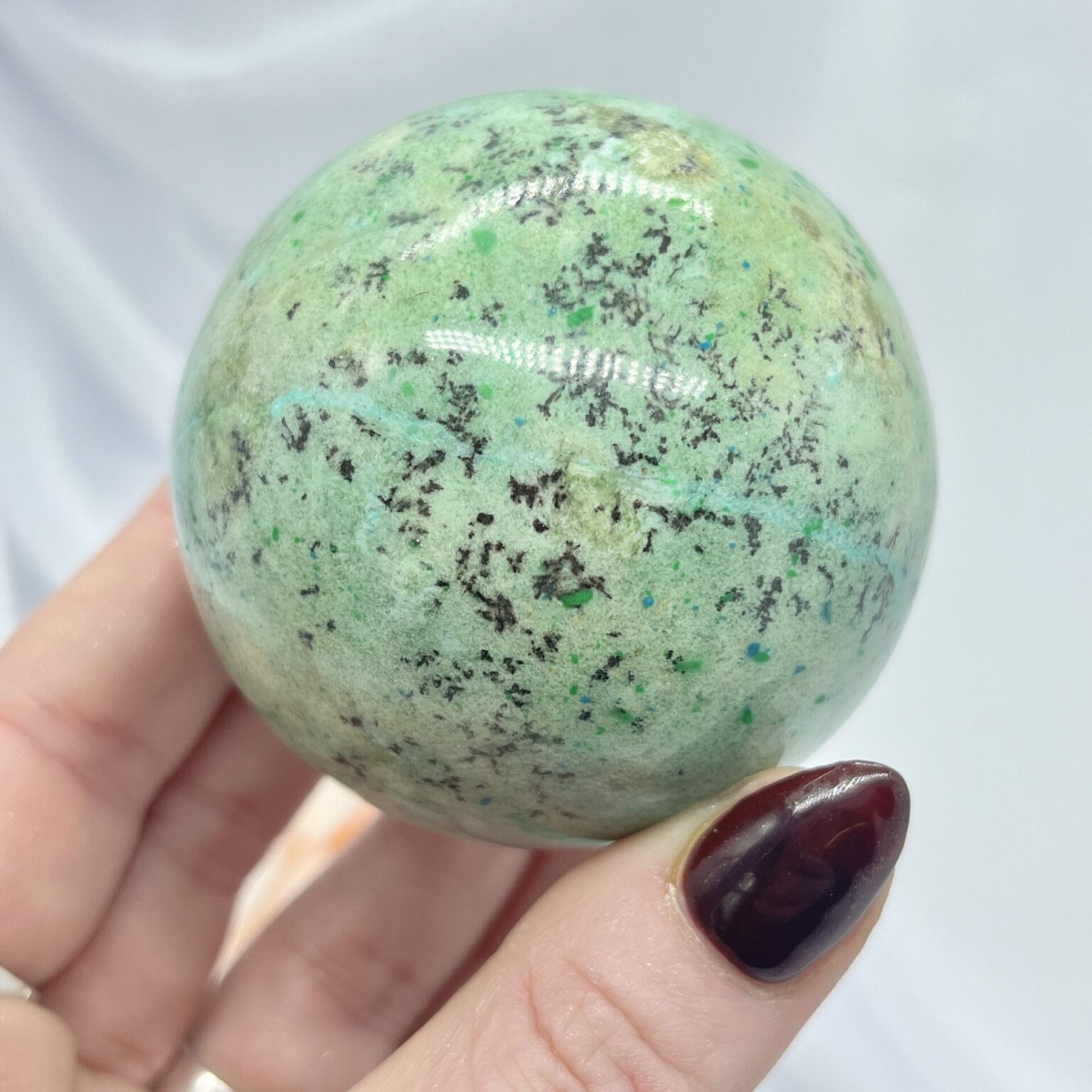 Tucson Unpacking: Dendritic Chrysocolla Sphere